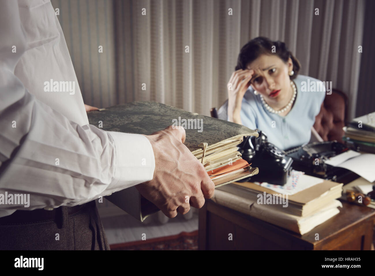 Stressed businesswoman with a too much paperwork and documents Stock ...