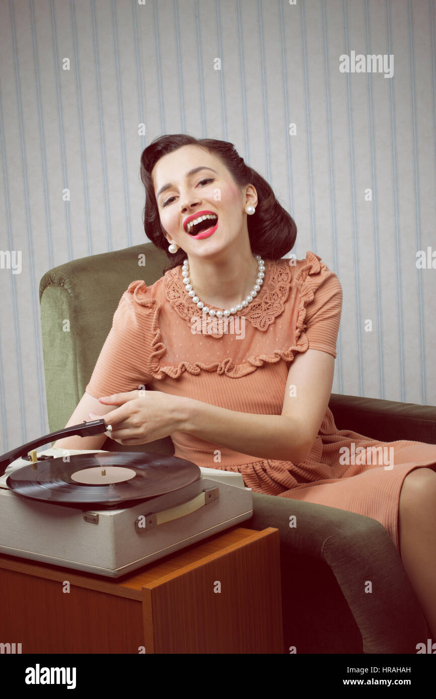 Woman at a turntable hi-res stock photography and images - Alamy