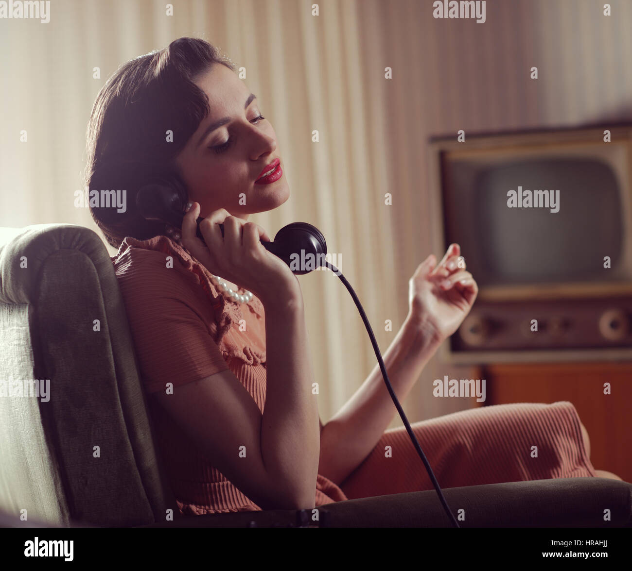 Woman with phone 1950 hi-res stock photography and images - Alamy