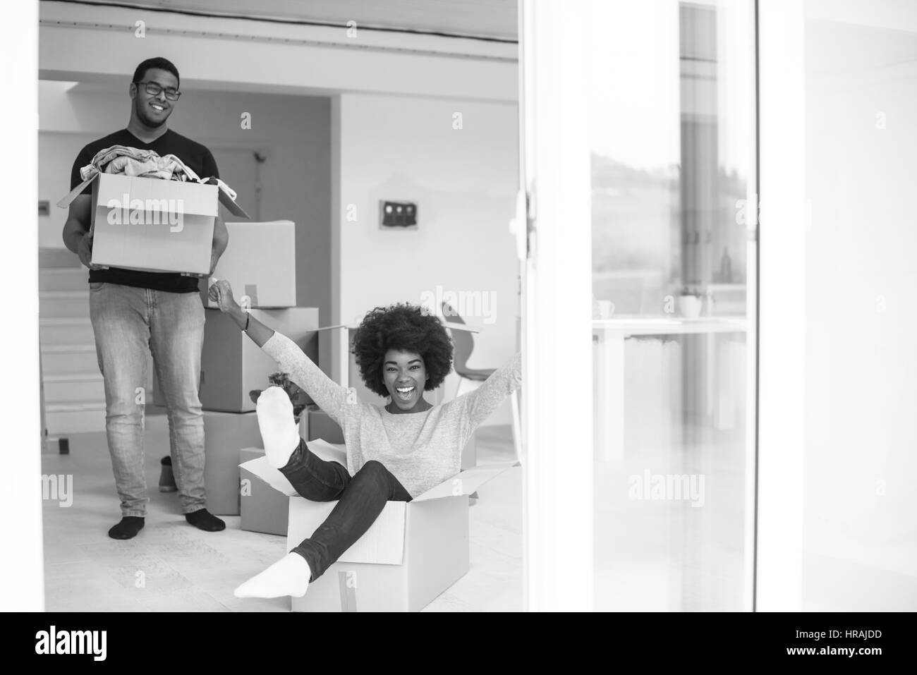Happy african american family sitting Black and White Stock Photos ...