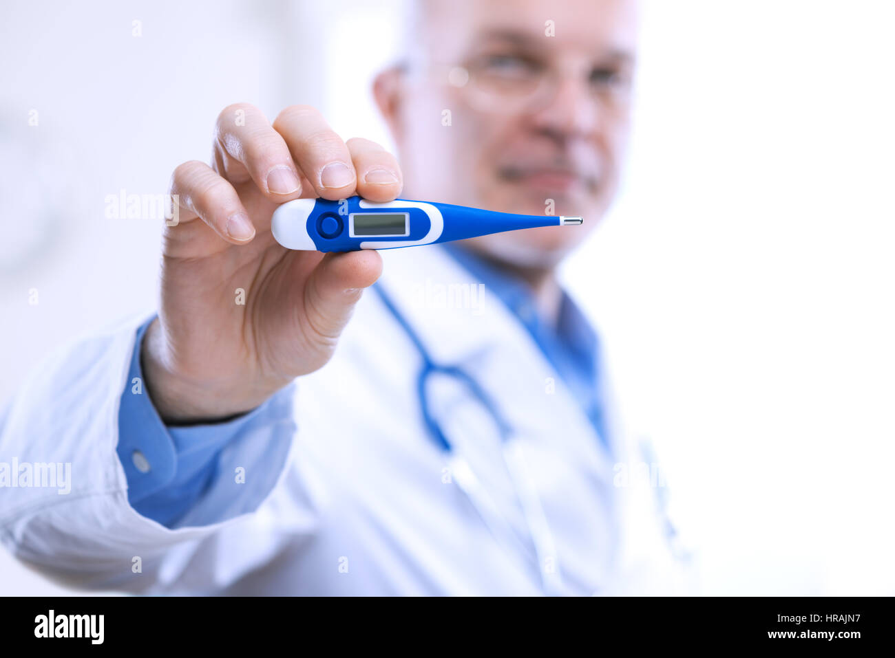Senior doctor with thermometer measuring and showing temperature Stock ...
