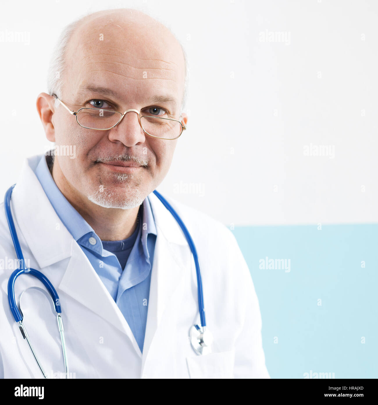 Portrait of Friendly confident doctor at hospital Stock Photo - Alamy