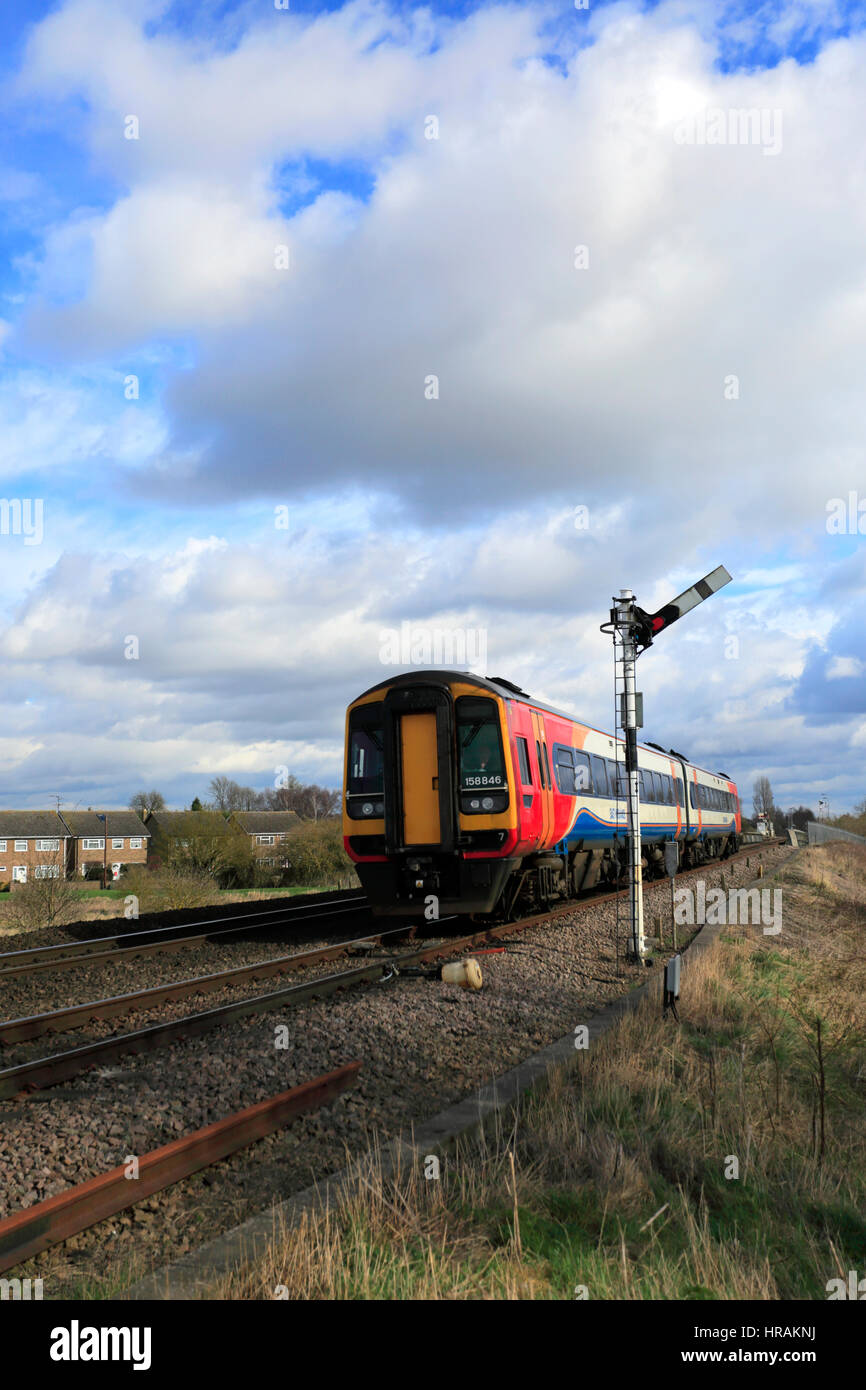 East Midlands Trains, 158856 passing an unmanned level crossing ... East Midlands Trains, 158856 passing an unmanned level crossing ...