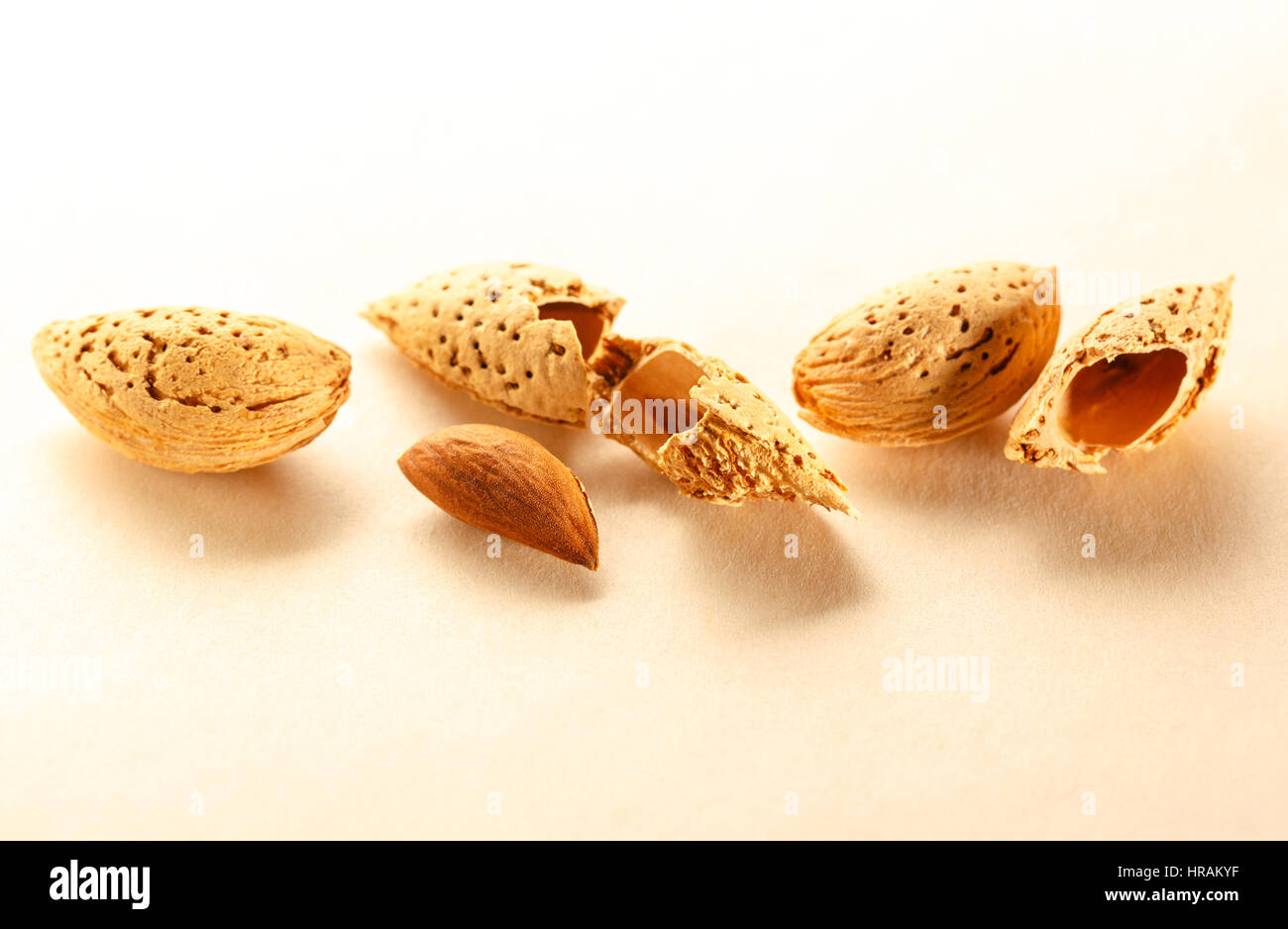 Dry almond nuts with shadow in closeup Stock Photo - Alamy