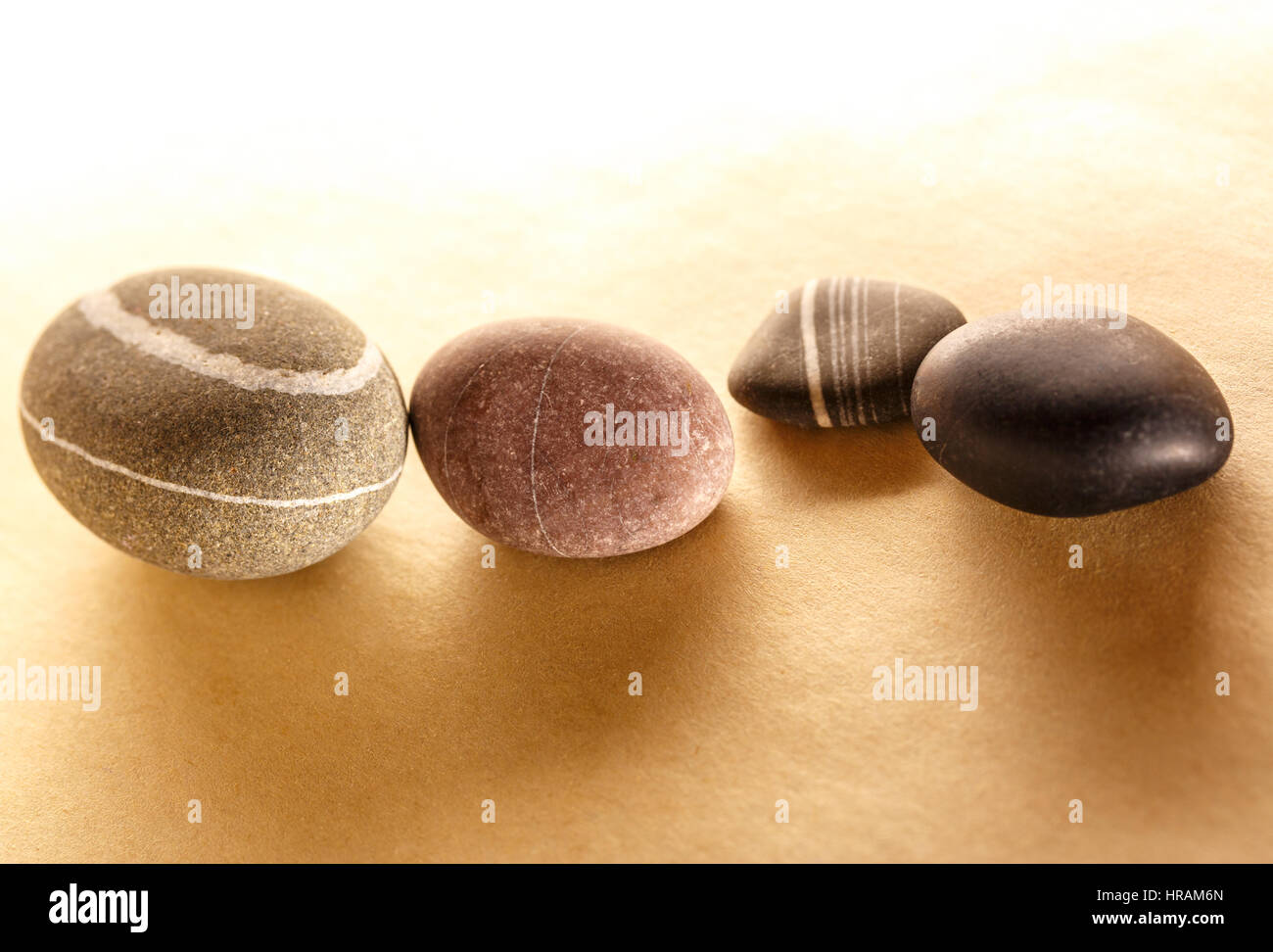 Set of sea stones on paper background Stock Photo - Alamy