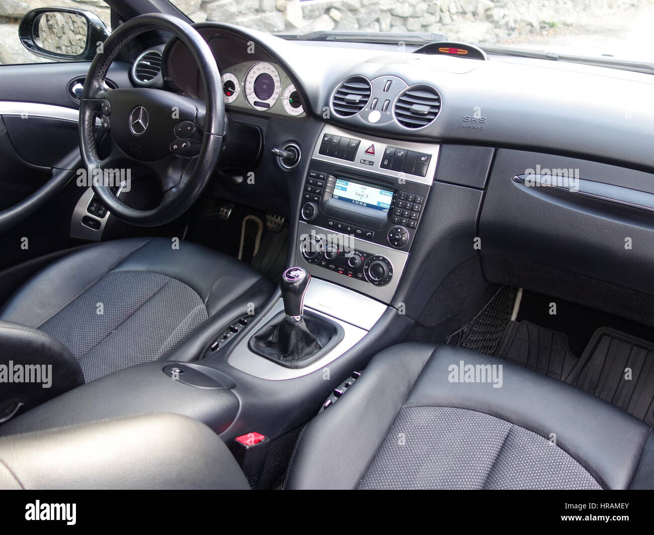 View of central panel dashboard unit with audio controls and ...