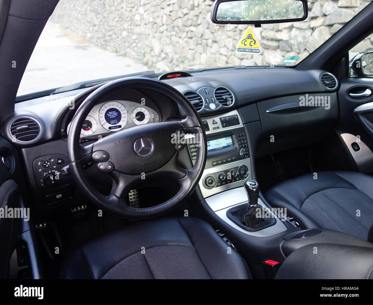View of central panel dashboard unit with audio controls and ...