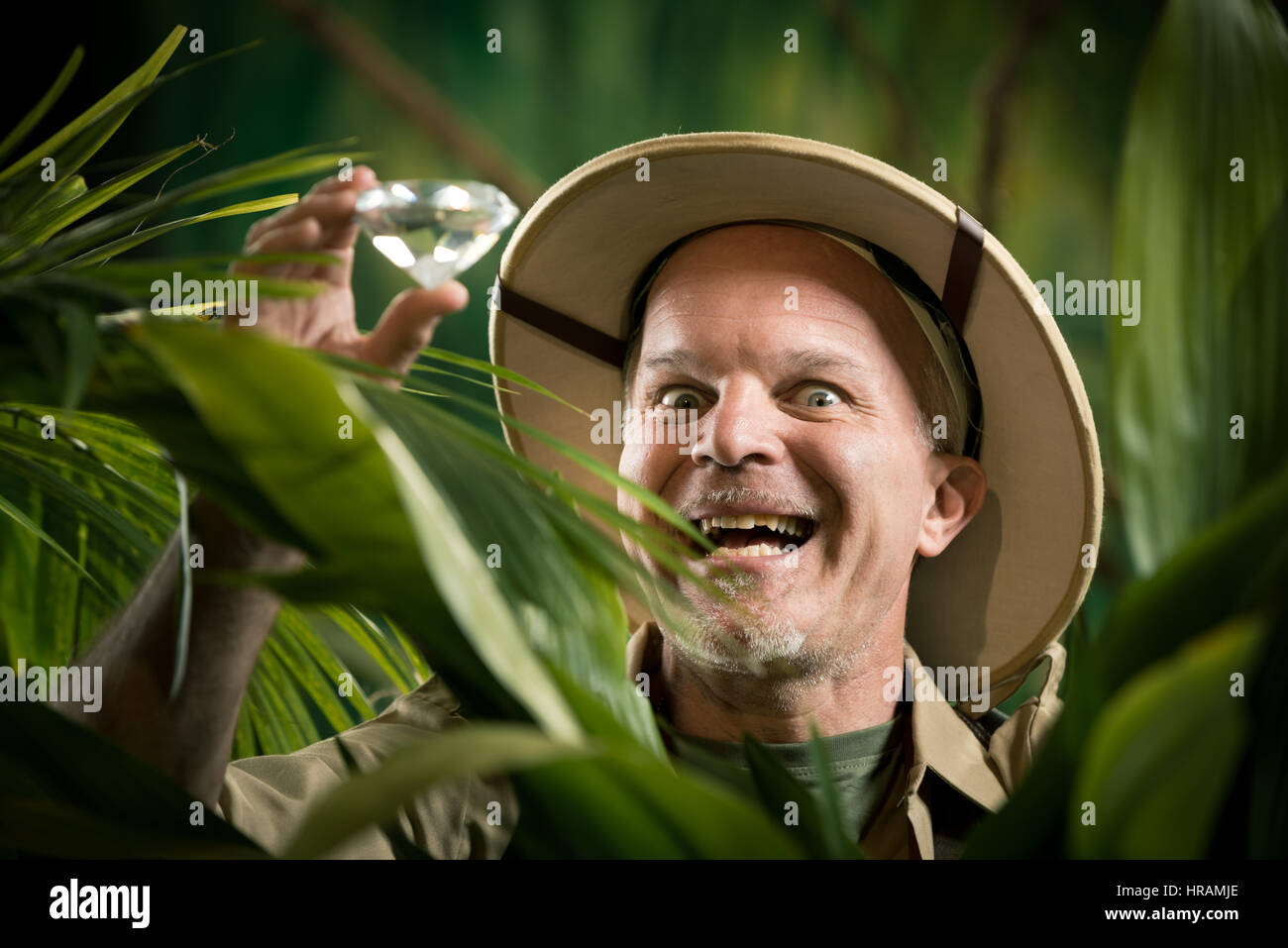 Explorer finding a huge precious gem in the jungle wilderness Stock ...