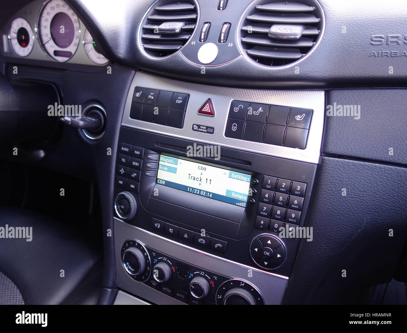 View of central panel dashboard unit with audio controls and ...