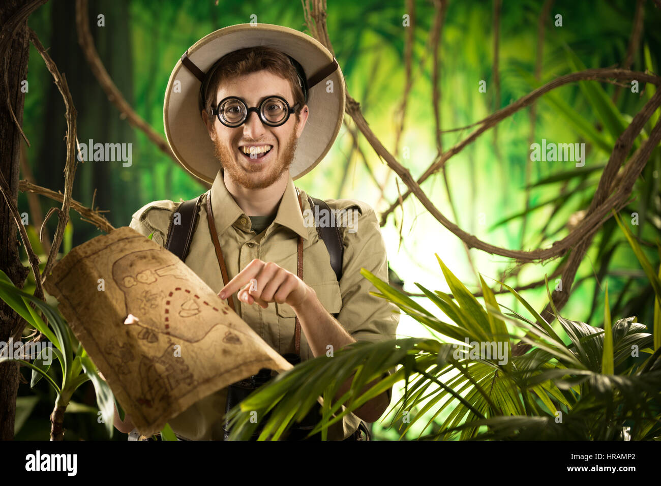 Cheerful explorer in jungle hi-res stock photography and images - Alamy
