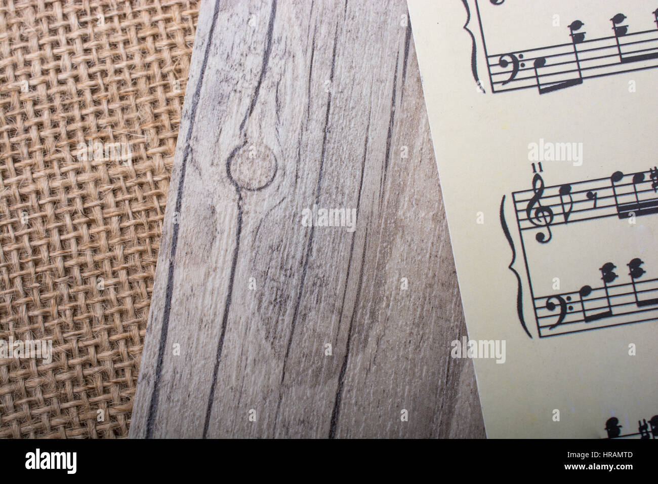 Musical notes on paper placed on a linen canvas Stock Photo - Alamy