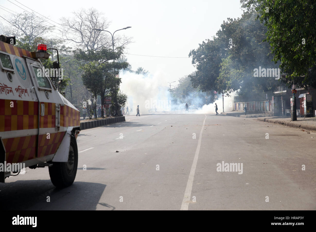 Dhaka, Bangladesh. 28th Feb, 2017. Police use a water canon and tear ...