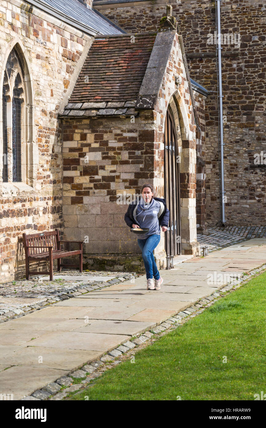 Woman running in a pancake race hi-res stock photography and images - Alamy