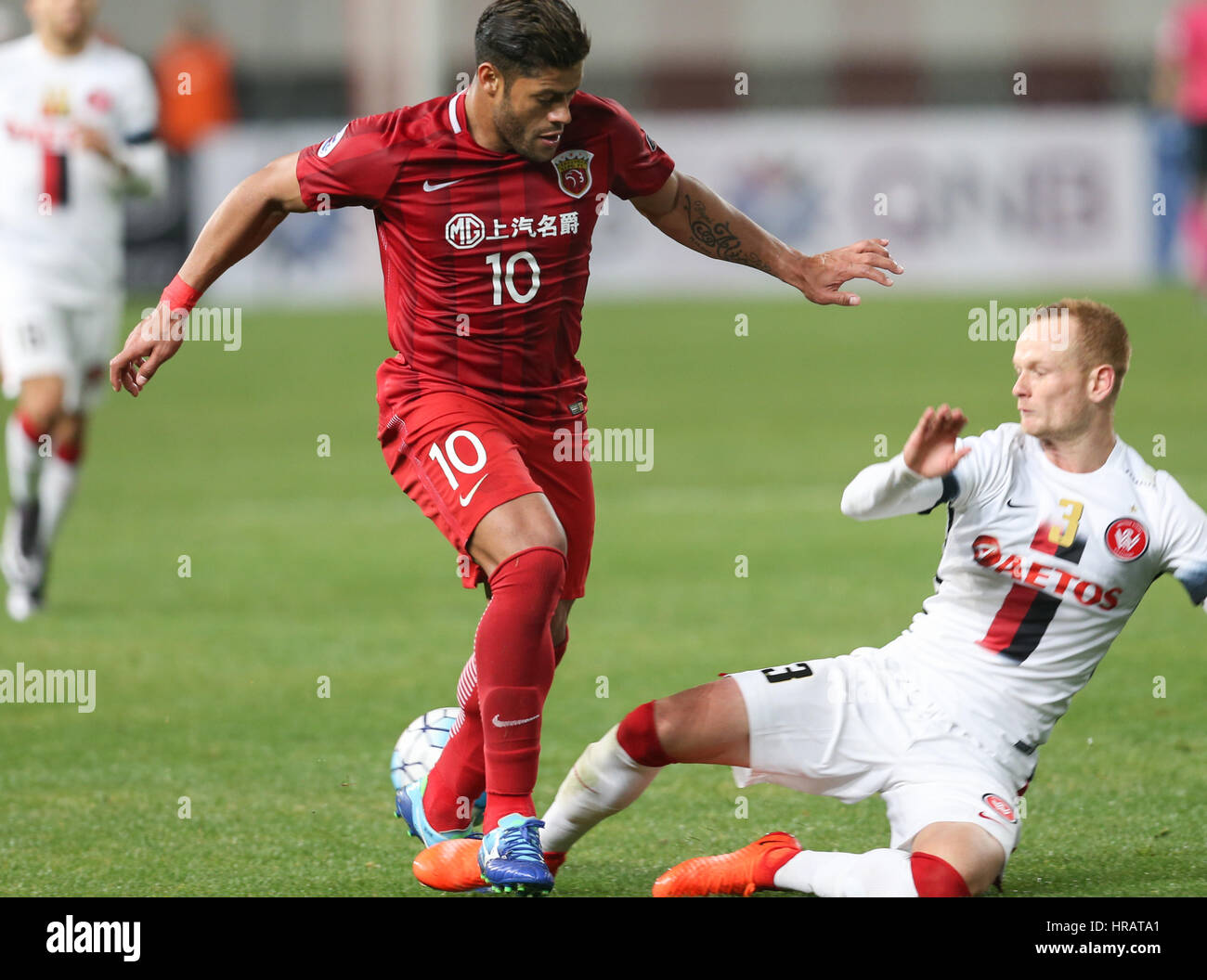 Shanghai, China. 28th Feb, 2017. Hulk (L) of China's Shanghai SIPG FC ...