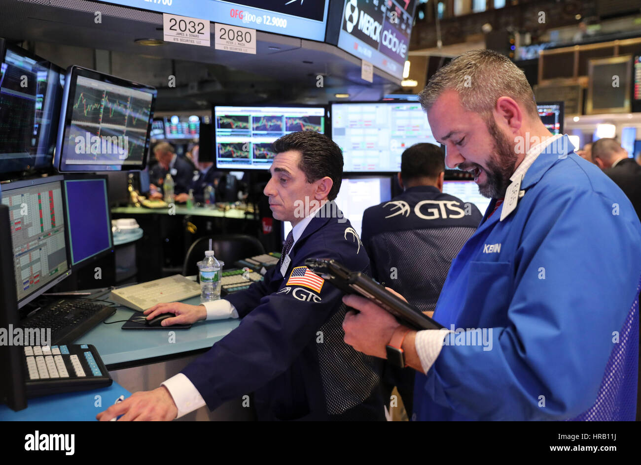 New York, USA. 28th Feb, 2017. Traders work at the New York Stock ...