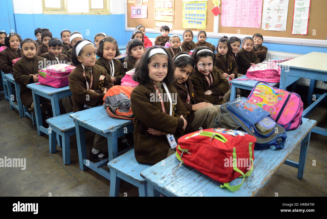 Srinagar, Kashmir. 1st Mar, 2017. School children attend the first day ...