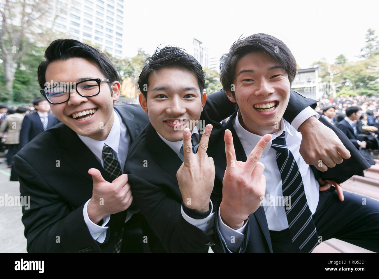 Tokyo, Japan. 1st Mar, 2017. College graduates pose for a photograph ...