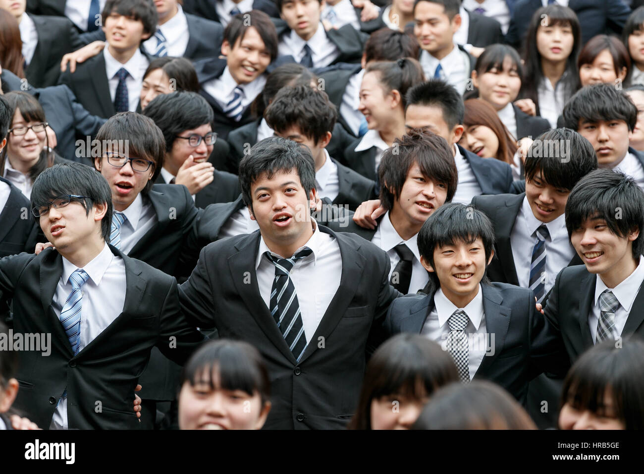 Tokyo, Japan. 1st Mar, 2017. College graduates shout slogans during a ...