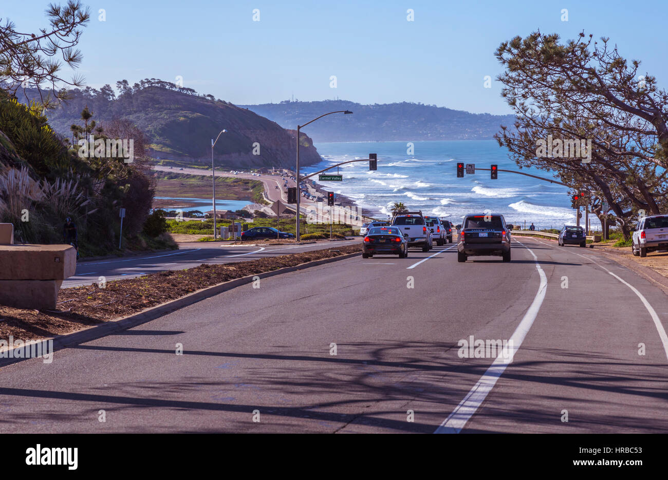 Cars on North Torrey Pines Road in the morning with ocean and coastal ...