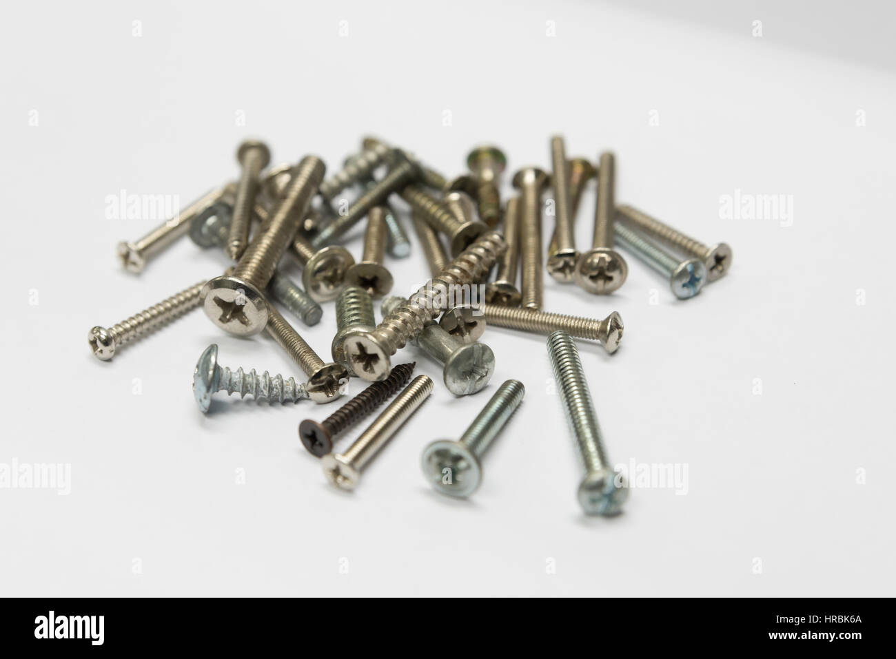 Some screws on the desk Stock Photo - Alamy