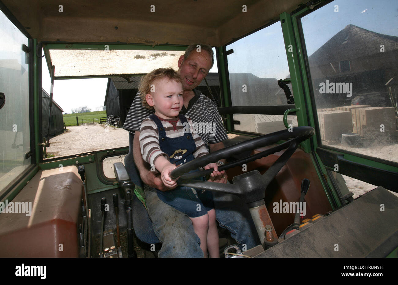 farmer's boy at work Stock Photo - Alamy