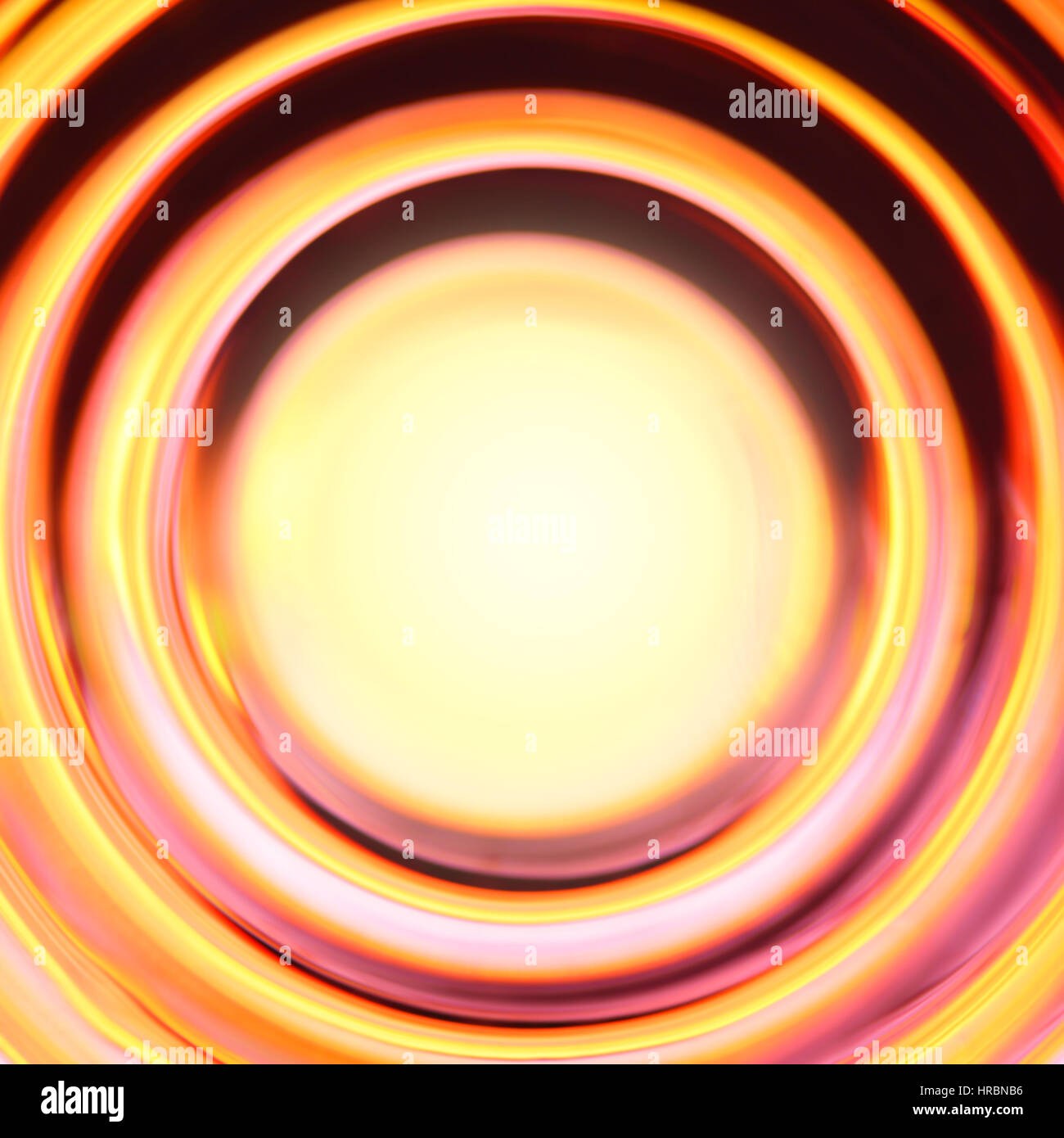 Yellow abstract background with defocused concentric circles - space ...