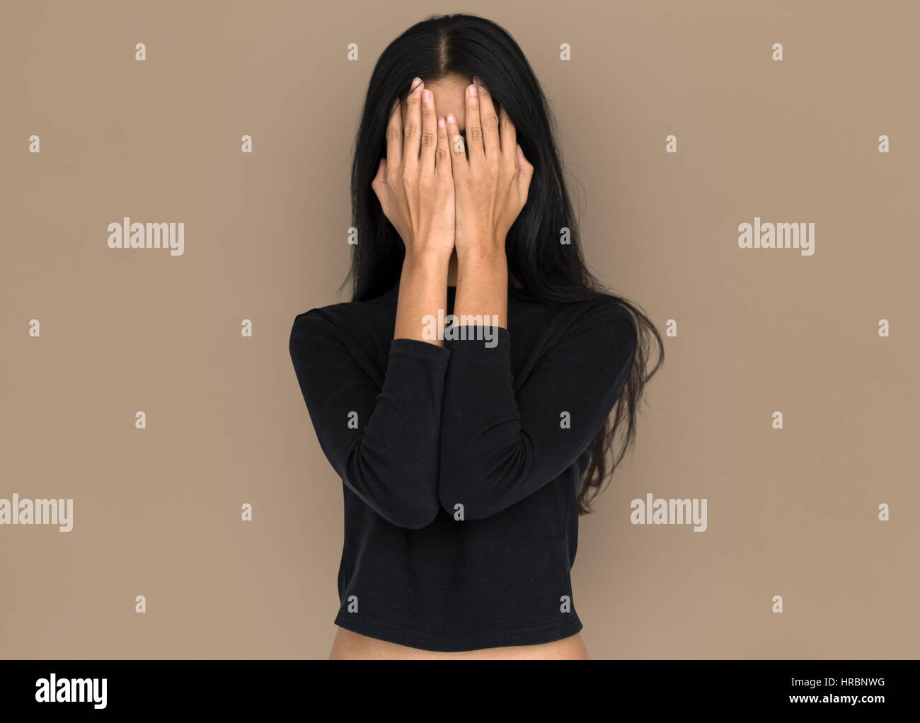 Asian girl covering face with hands hi-res stock photography and images ...
