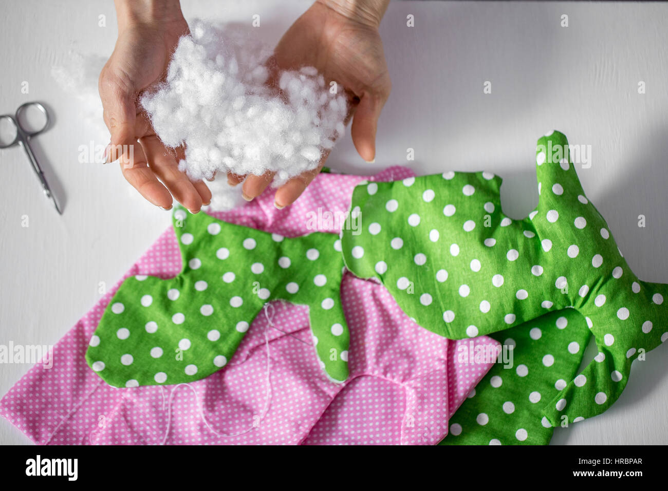The easter toy stuffing process Stock Photo - Alamy