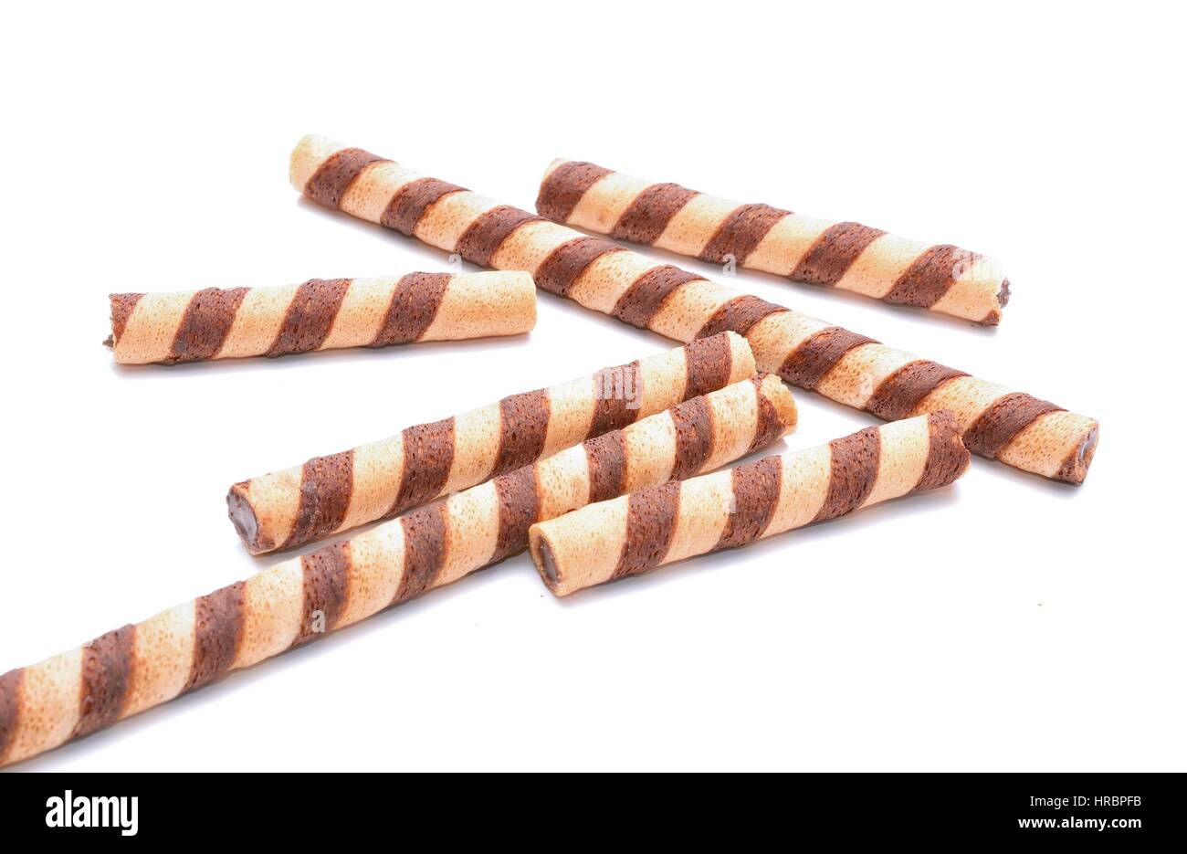 Chocolate sticks on white background Stock Photo - Alamy