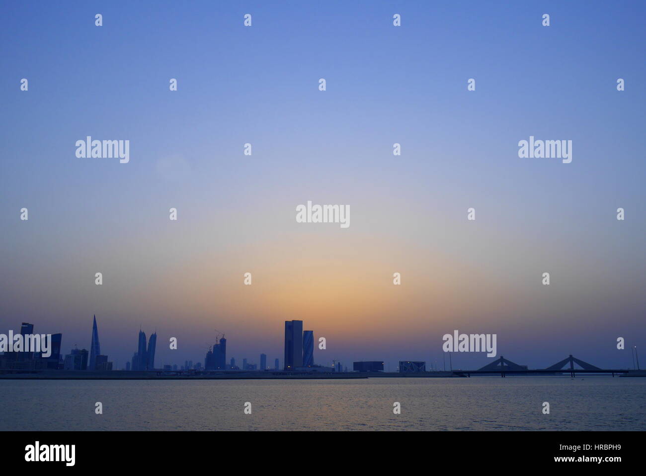 View of Manama at sunset seen from Muharraq, Kingdom of Bahrain Stock ...