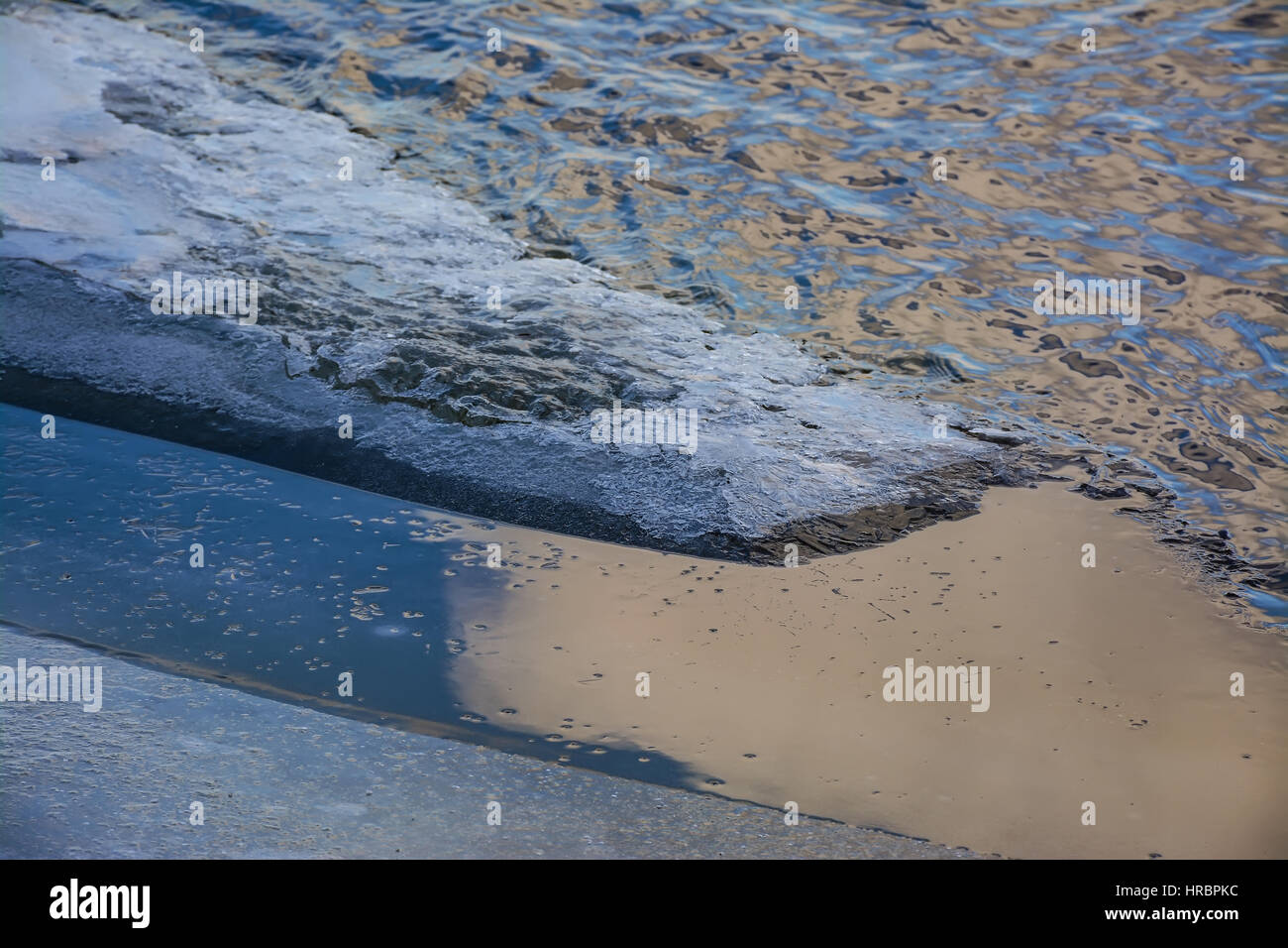 The reflection of the sky in cold water Stock Photo - Alamy