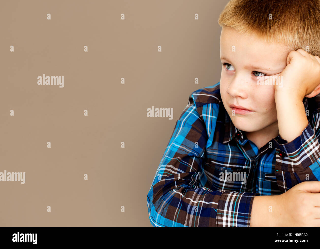 Caucasian Little Boy Frowning Sulking Stock Photo - Alamy