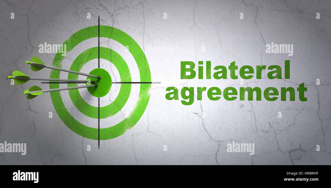Insurance concept: target and Bilateral Agreement on wall background ...