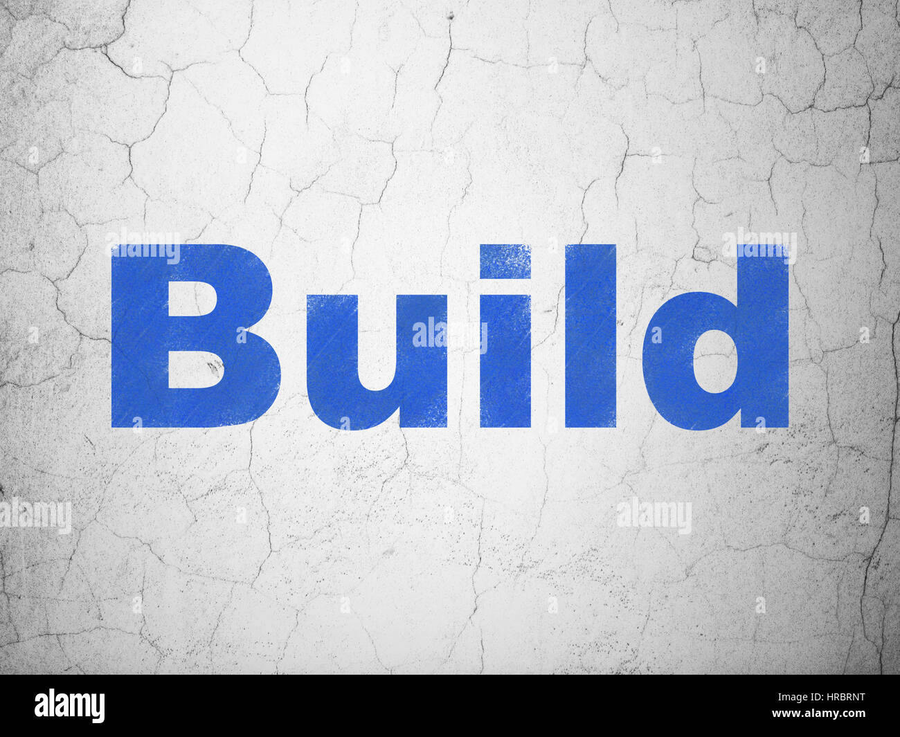Constructing concept: Build on wall background Stock Photo - Alamy