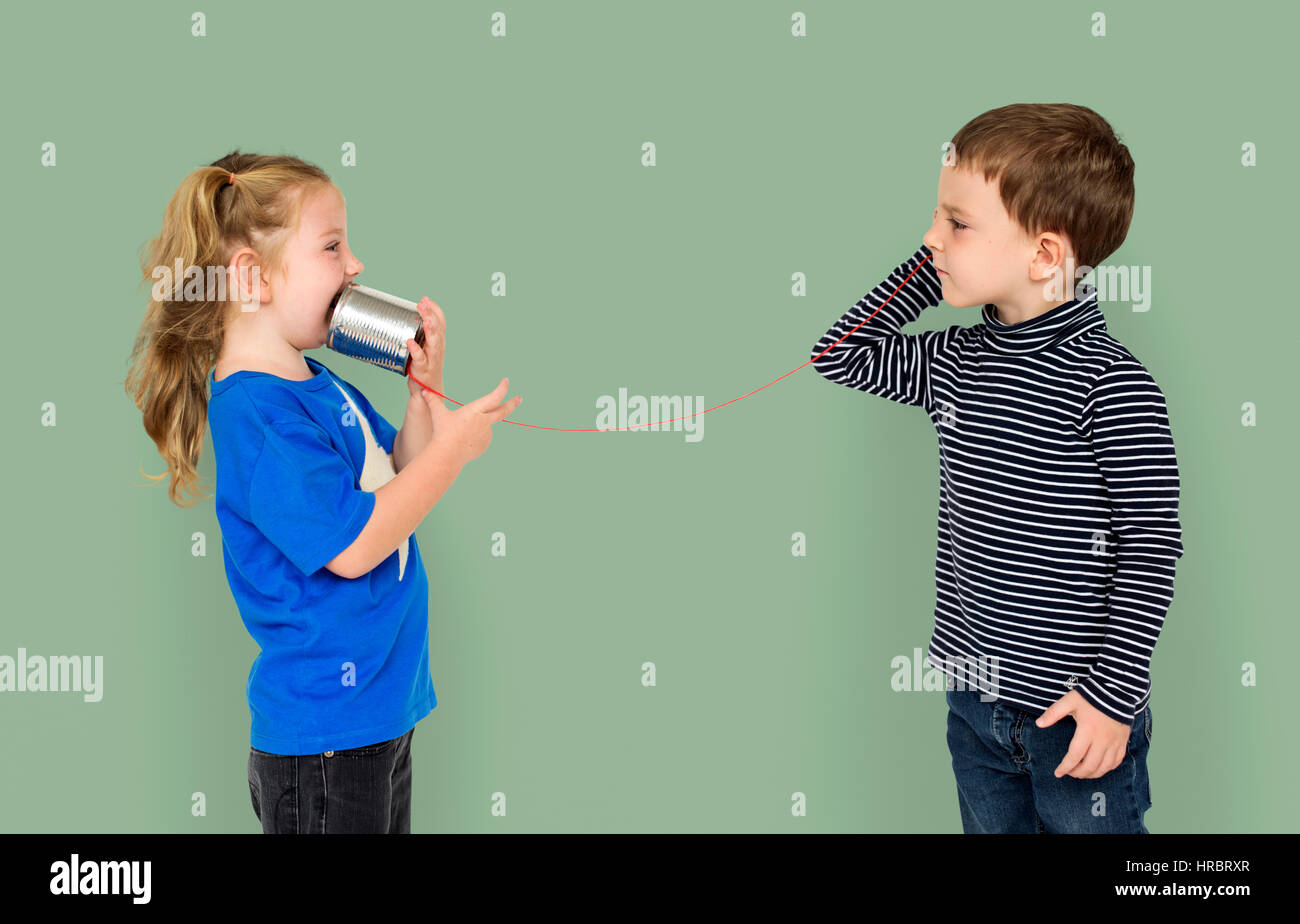 Little Kids Using String Phone Adorable Cute Stock Photo - Alamy