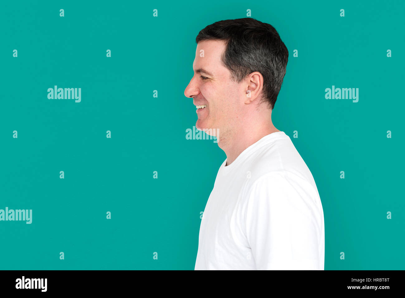 Caucasian Man Smiling Happy Side View Stock Photo - Alamy