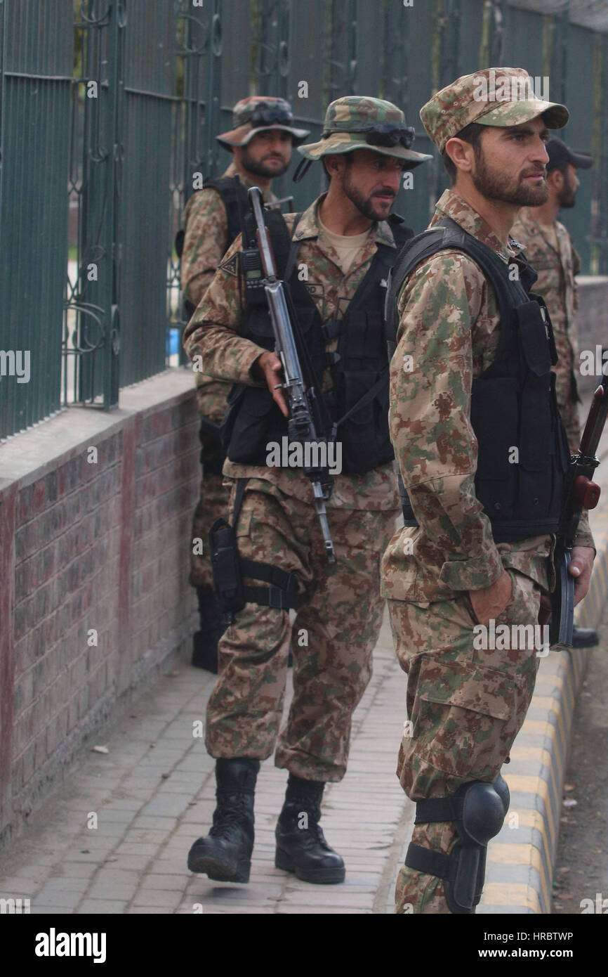 Lahore, Pakistan. 28th Feb, 2017. Pakistani soldiers stand alert ...