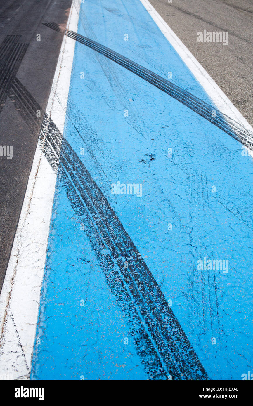 tyre marks on race track Stock Photo - Alamy