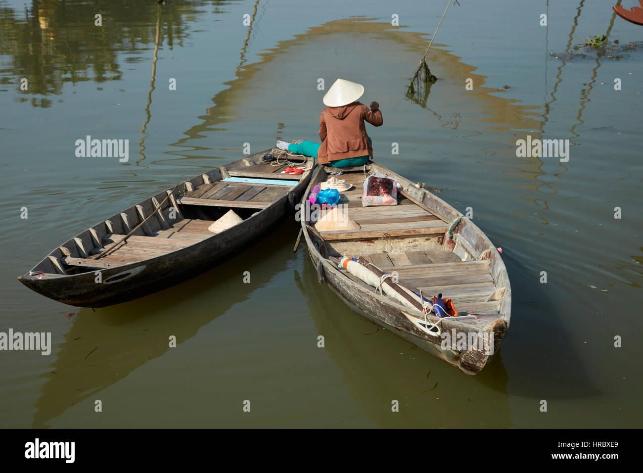 Lady fishing from boats on Thu Bon River, Hoi An (UNESCO World Heritage ...