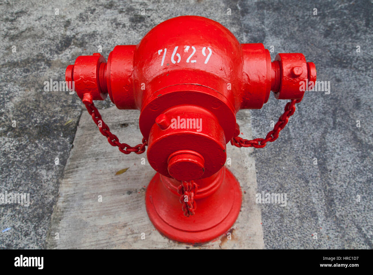Red-painted fire hydrant on Serangoon Road, Singapore Stock Photo - Alamy