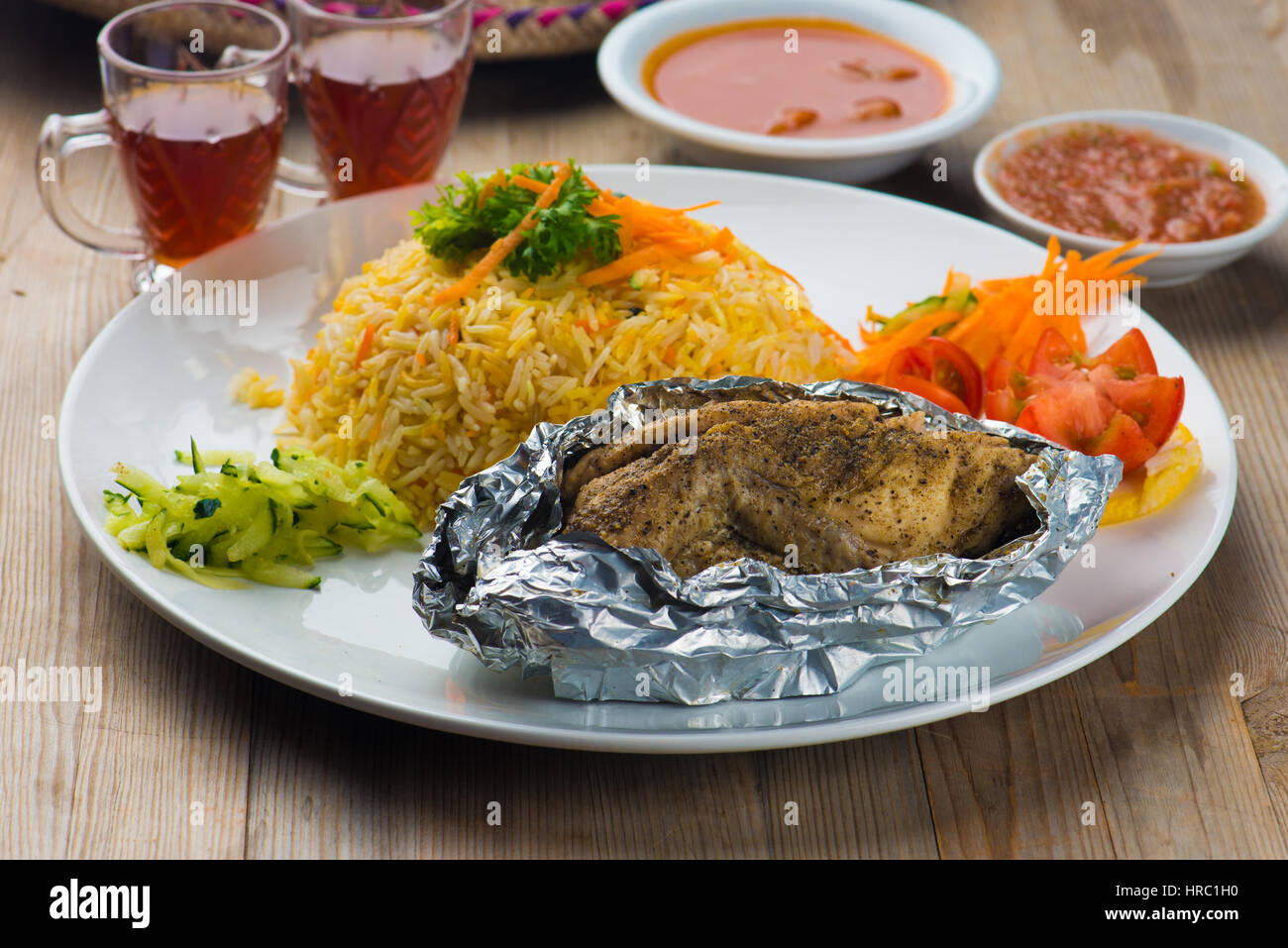 Chicken madhbi or madbi traditional arabic food Stock Photo - Alamy