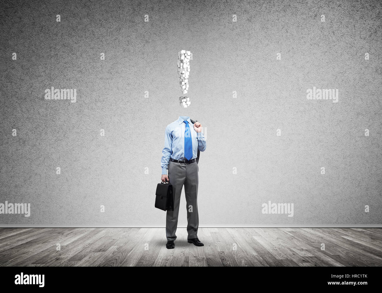 Faceless businessman with exclamation sign instead of head Stock Photo ...