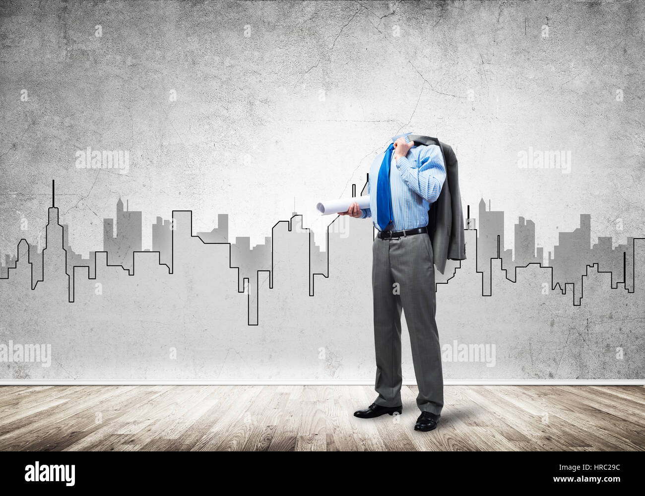 Headless engineer man with papers in hand against construction ...