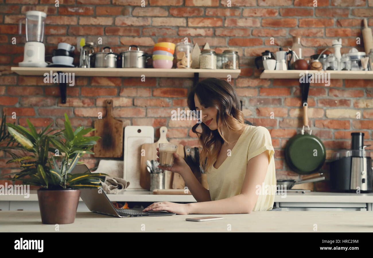Lovely girl in the kitchen Stock Photo - Alamy