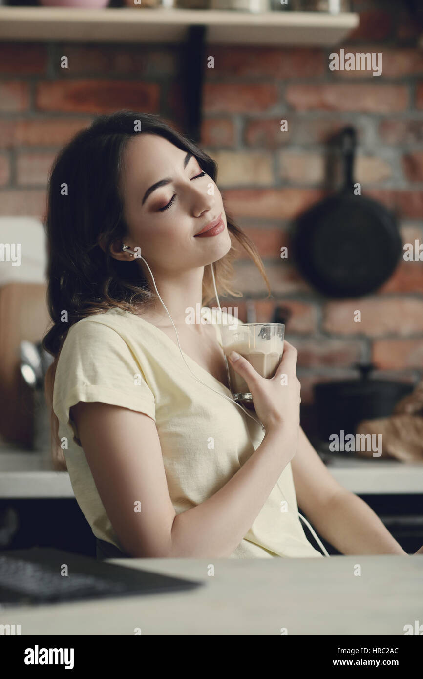 Lovely girl in the kitchen Stock Photo - Alamy