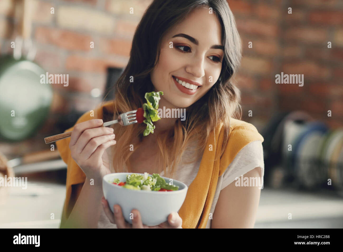 Lovely girl in the kitchen Stock Photo - Alamy
