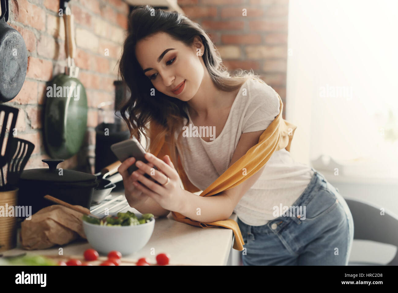 Lovely girl in the kitchen Stock Photo - Alamy