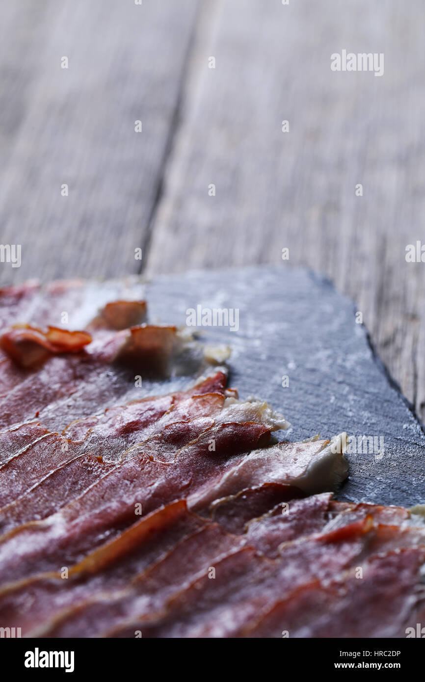 Raw bacon on the table Stock Photo - Alamy