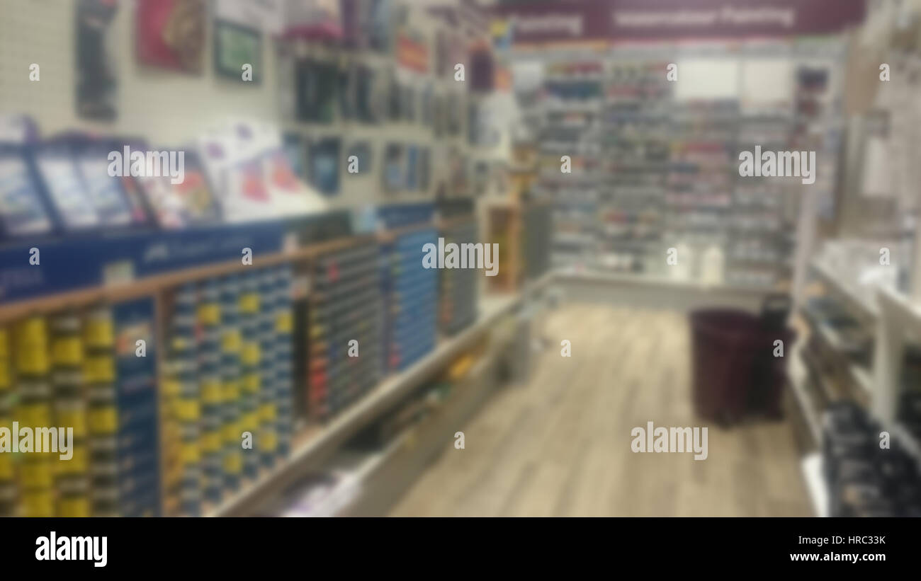 Stacked shelves inside a craft shop. Out of focus Stock Photo - Alamy