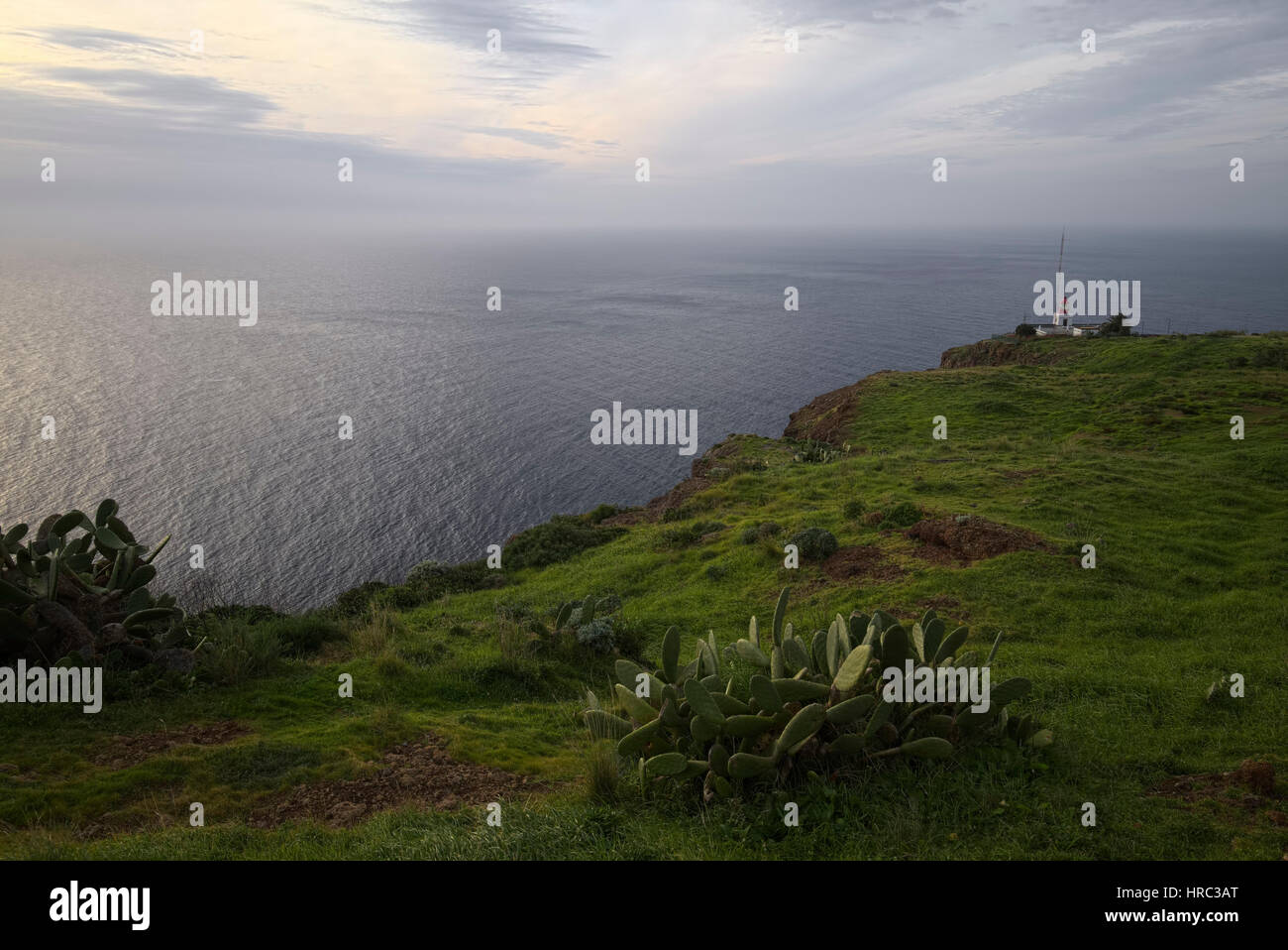 Sun setting at lighthouse of Ponta do Pargo, Madeira, Portugal Stock ...